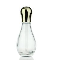 China 60ml Serum Dropper Bottles Unique Shape Glass Bottle For Serum With Gold Cap for sale