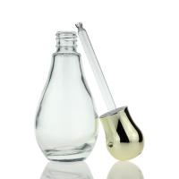 China 60ml Serum Dropper Bottles Unique Shape Glass Bottle For Serum With Gold Cap for sale