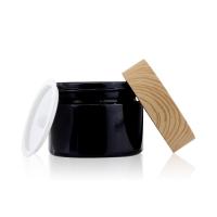 China Black Matte Cosmetic Glass Jars 50g with Bamboo Screw Cap for sale