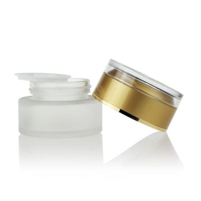 China 20g Frosted Glass Cream Jar With Luxury Acrylic Gold Lid for sale