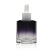 China Luxury Fat 40ml Glass Liquid Foundation Bottles Round Colored for sale