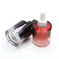 China Luxury Fat 40ml Glass Liquid Foundation Bottles Round Colored for sale