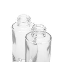 China 30ml Empty Lotion Bottle Transparent Foundation Glass Serum Lock Pump Bottle for sale