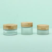 China Face Cream Packaging Glass Cosmetic Cream Jar 30g With Screw Bamboo Cap for sale