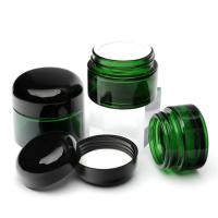 China Empty Round Green Glass Cosmetic Cream Jars 20g 30g With Screw Lid for sale