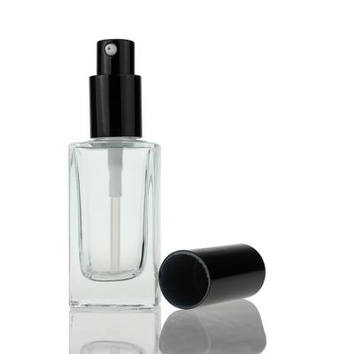 China 30ml Drop Transparent Small Square Glass Serum Bottle Process Available for sale
