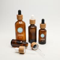 China Bamboo Collar Amber Oil Dropper Glass Bottle For Personal Care for sale