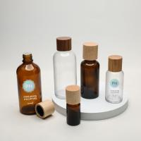 China Bamboo Collar Amber Oil Dropper Glass Bottle For Personal Care for sale