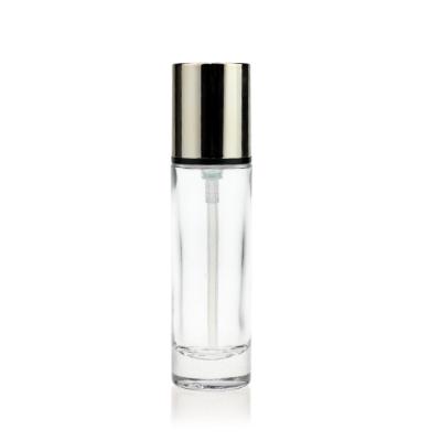 China Cosmetics Packaging 30ml Liquid Foundation Glass Bottle With Pump for sale