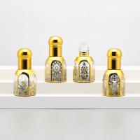 China Beauty Packaging Mini Glass Roll On Bottles 12ml For Perfume Packaging Golden Glittering for sale