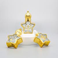 China Beauty Packaging Mini Glass Roll On Bottles 12ml For Perfume Packaging Golden Glittering for sale