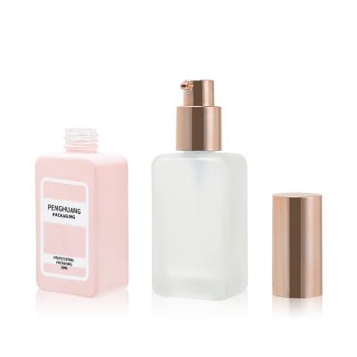 China Lotion Pump Glass Foundation Bottle Gold Square Skin Care Cosmetic Packaging 35ml for sale