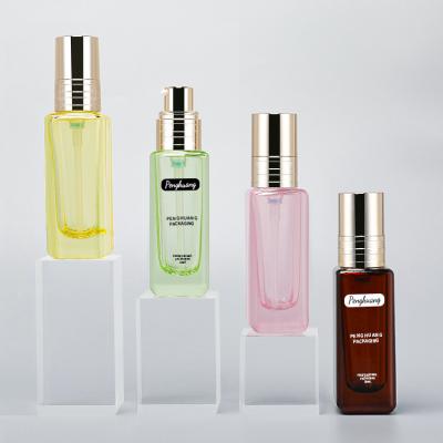 China 30ml Foundation Glass Bottle Colorful Golden Pump Painting Color Logo Design for sale