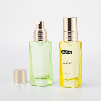 China Golden Pump Lotion Glass Bottles Blue Pink Green Amber Semi Color Transparent 30ml for sale