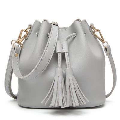 China Fashion Ladies Mini Tassel Vegan Leather Hand Cheap Leather Bags for sale