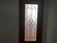 China Oval Shaped Iron Glass Entry Doors , Antiseptic Wrought Iron Doors With Glass for sale