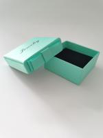 China Flexo Cosmetic Paper Printed Packaging Box Embossing Bright Green for sale