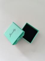 China Flexo Cosmetic Paper Printed Packaging Box Embossing Bright Green for sale
