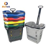 China Red Telescopic Handle Plastic Rolling Basket With Two Wheels For Convenience Store for sale