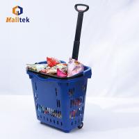 China Red Telescopic Handle Plastic Rolling Basket With Two Wheels For Convenience Store for sale
