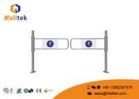 China Stainless Steel Shop Interior Fittings Safety Supermarket Swing Barrier for sale