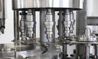 China 200ml - 2L Automatic Bottle Filling Machine , PET Bottle Carbonated Drinks Filling Line for sale
