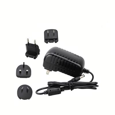 China 9V 1A AC Switching Adapter Interchangeable Plug Adapter 2 Years Warranty for sale