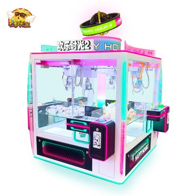 China 4 Player Fun Awaits With Dazzling LED Lights and 4 Independent Cranes High-Quality  Engaging Commercial Mini Doll Crane Machine for sale