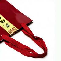 China Red Art Paper Bags Reusable Heavy Duty Paper Bags Customized With PP Handle for sale