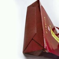 China Red Art Paper Bags Reusable Heavy Duty Paper Bags Customized With PP Handle for sale
