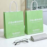 China Reusable Twisted Handle Paper Bag Green Custom Logo Shopping Bags Eco Friendly for sale