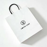 China Biodegradable Twisted Handle Paper Bag Tear Resistant White Paper Handle Bags for sale