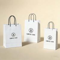 China Biodegradable Twisted Handle Paper Bag Tear Resistant White Paper Handle Bags for sale
