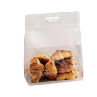 China Portable Die Cut Bag Resealable Stand Up Paper Bags With Die Cut Handle for sale