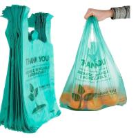 China Lightweight T Shirt Plastic Bag Eco Friendly Custom T Shirt Bags With Logo for sale