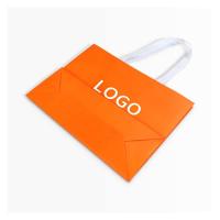 China Recyclable Flat Handle Paper Bag White / Black / Pink / Orange Shopping Gift Bag for sale