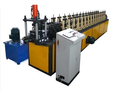 China Ondulado Shutter Door Roll Forming Machine For Zinc Aluminium 0.12-0.4mm Thickness for sale
