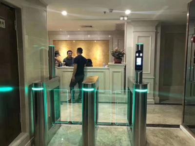 China 60hz Biometric Turnstile QR Code Scanner Face Recognition RFID Card Glass Swing Barrier Gate for sale