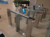 China Electrical Pedestrian Swing Gate Barrier Walkways Turnstile Gate Access for sale
