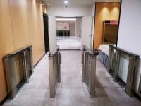 China Electrical Pedestrian Swing Gate Barrier Walkways Turnstile Gate Access for sale