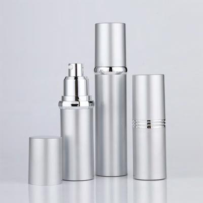 China Foundation Airless Vacuum Pump Lotion Bottle Shiny Silver Cream Pump Matte Silver Cap for sale