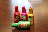 China Mini Wax Bottle Chocolate Packaging Machine 260 PPM High Speed Wrapping for sale