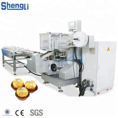 China PLC Controlled Customized Flow Wrap Machine for Chocolate Wafer Ball 200-300ppm for sale