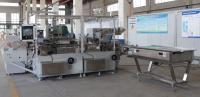 China Chocolate Tablet Packaging Machine with Double-layer Wrapping Heat-sealing and Glueing for sale