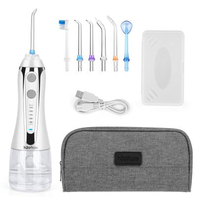 China OEM ODM IPX7 Waterproof Electric Teeth Cleaning Device with 300ml Capacity and 5 Pressure Modes for sale