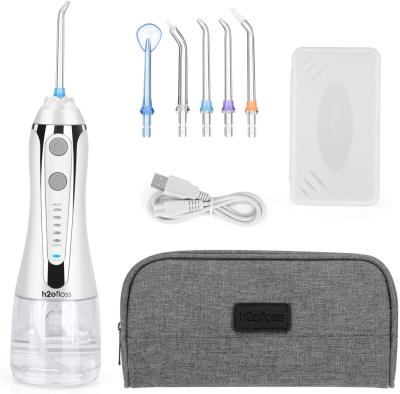 China IPX7 Waterproof Rechargeable Oral Irrigator 300ml Portable Electric Teeth Cleaner for sale