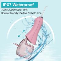 China 5 Mode Electric Water Flosser with 310ml Tank and 2500mAh Battery for Professional Oral Care for sale