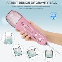 China 5 Mode Electric Water Flosser with 310ml Tank and 2500mAh Battery for Professional Oral Care for sale
