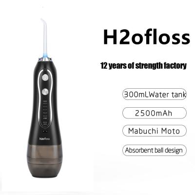 China Portable Electric Water Flosser with 5 Pressure Modes, 300ml Tank & IPX7 Waterproof Rating for sale