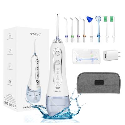 China 2500mAh Ultrasonic Teeth Cleaner 5 Modes Handheld Water Flosser Portable Oral Irrigator for sale